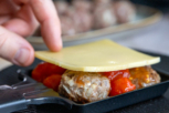 Raclette mit Hackfleischbällchen